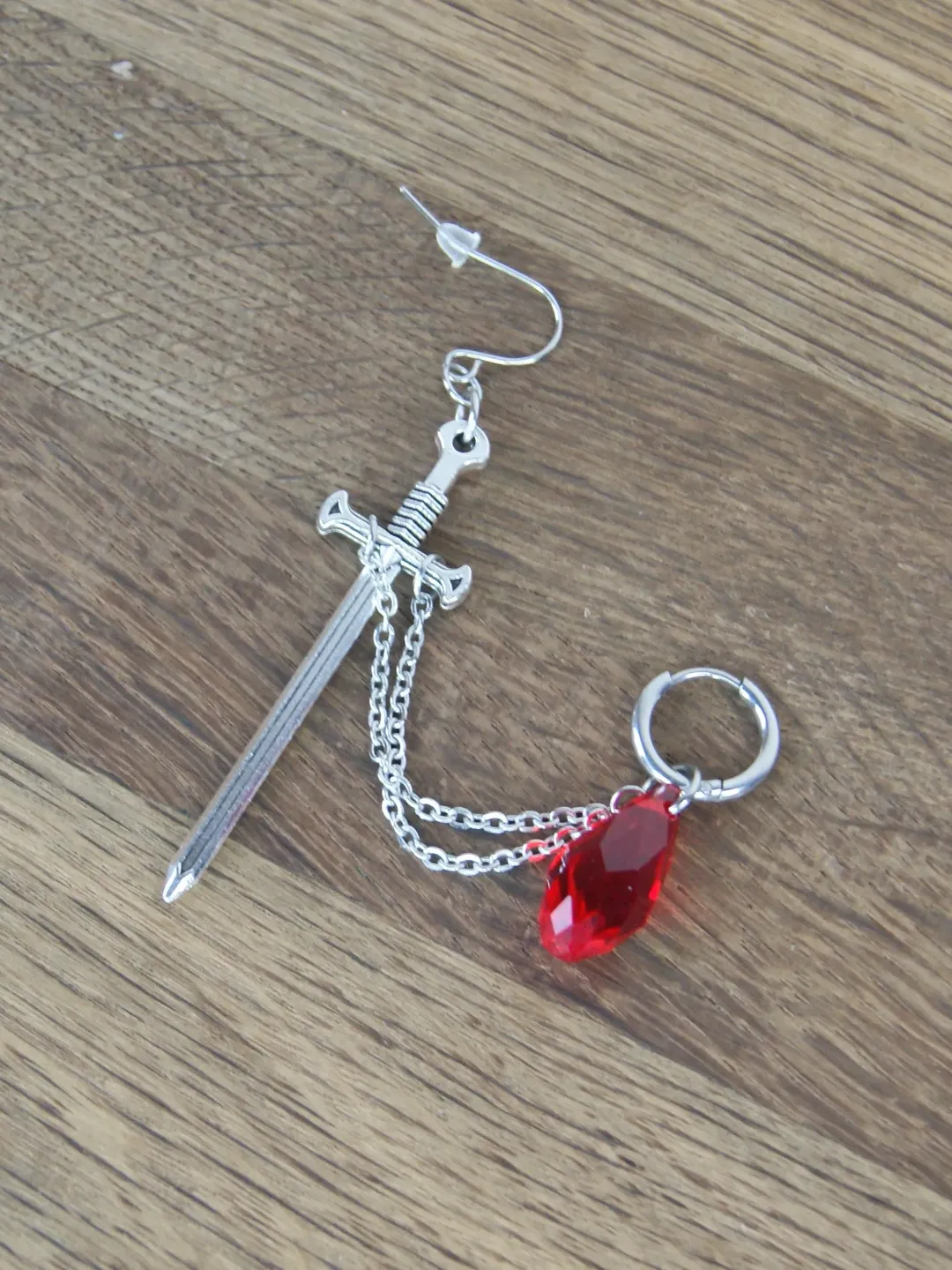 Single sword earring with red crystal Double piercing anime earring ...