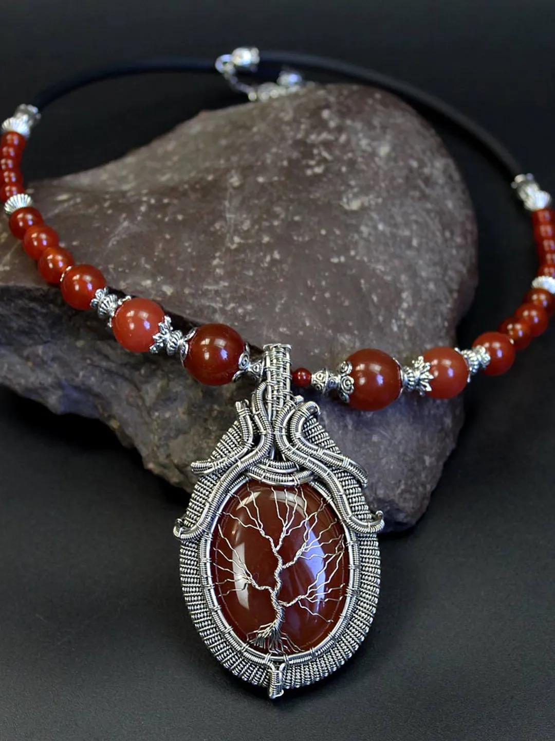 The Tree of Life necklace is handmade with natural birthstones.