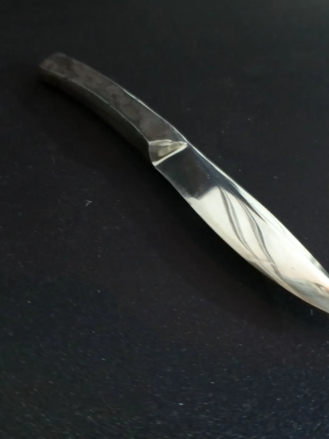 A Black & White, Raw knife without handle of French craftsmanship ...