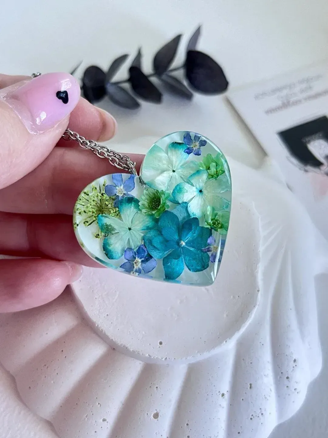Women's pendant around the neck made of epoxy resin with real flowers ...