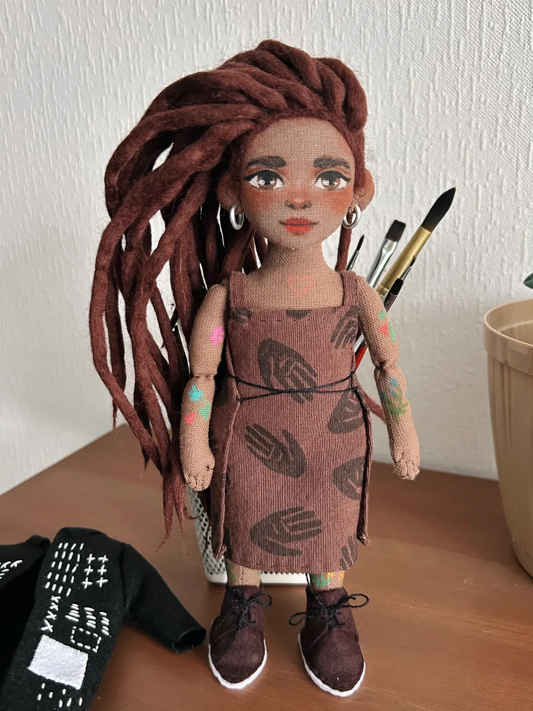 Textile doll lady with brown dreadlocks
