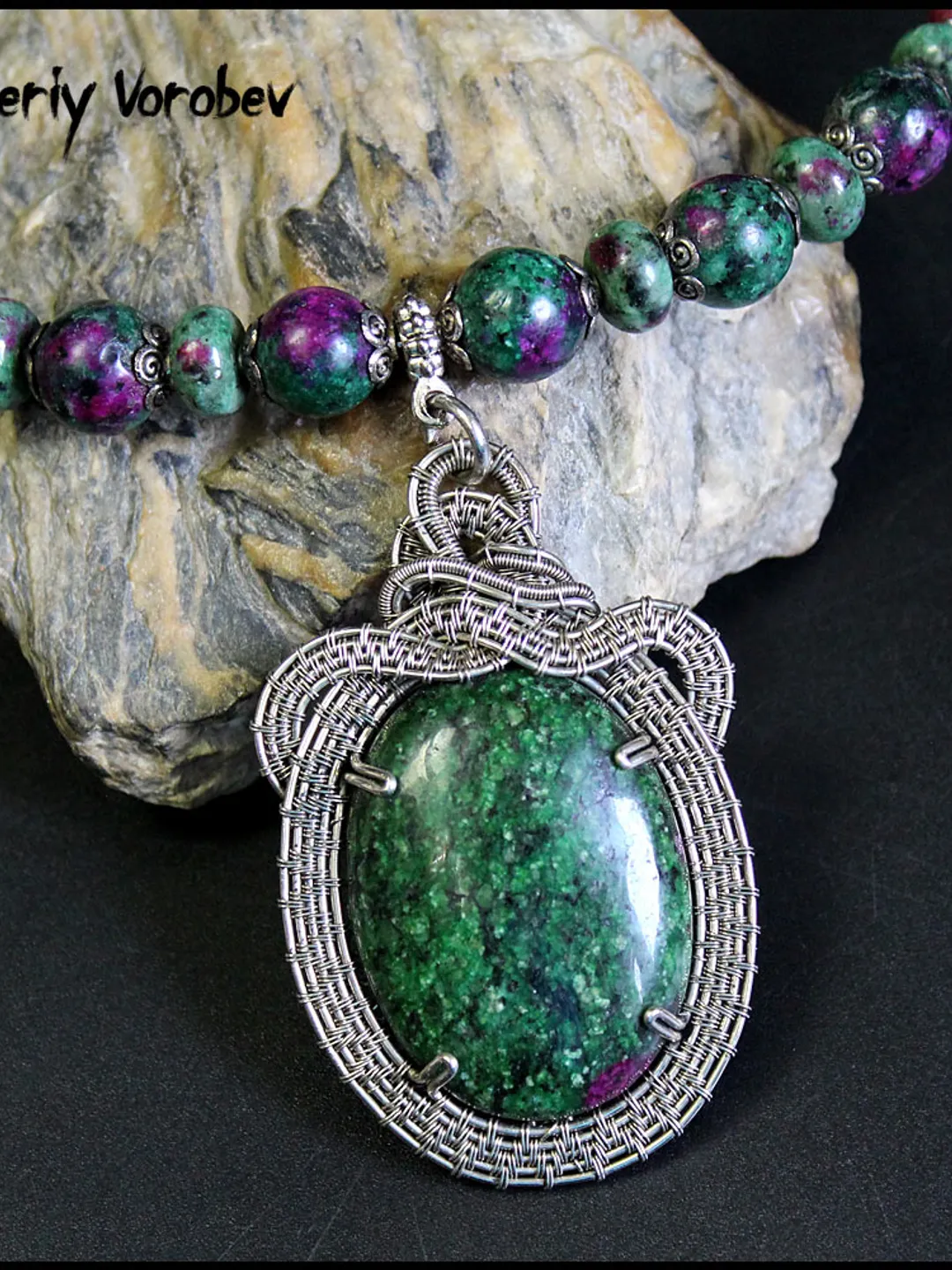 Handmade necklace with a pendant made of natural carnelian and brass wire.