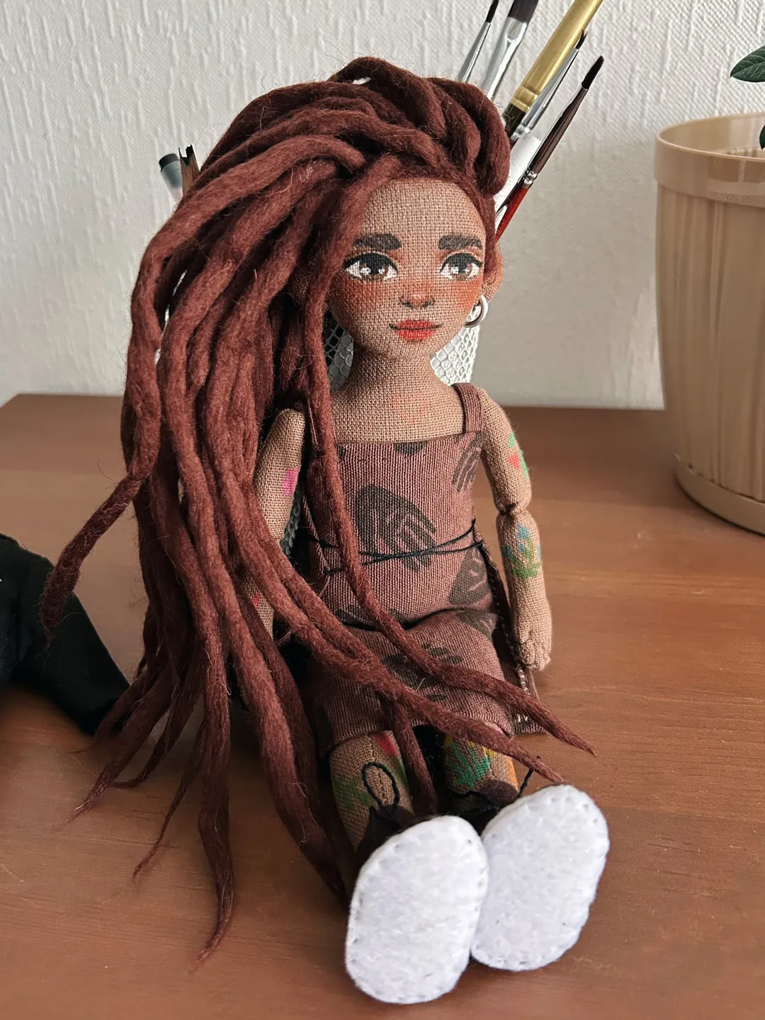 Textile doll lady with brown dreadlocks