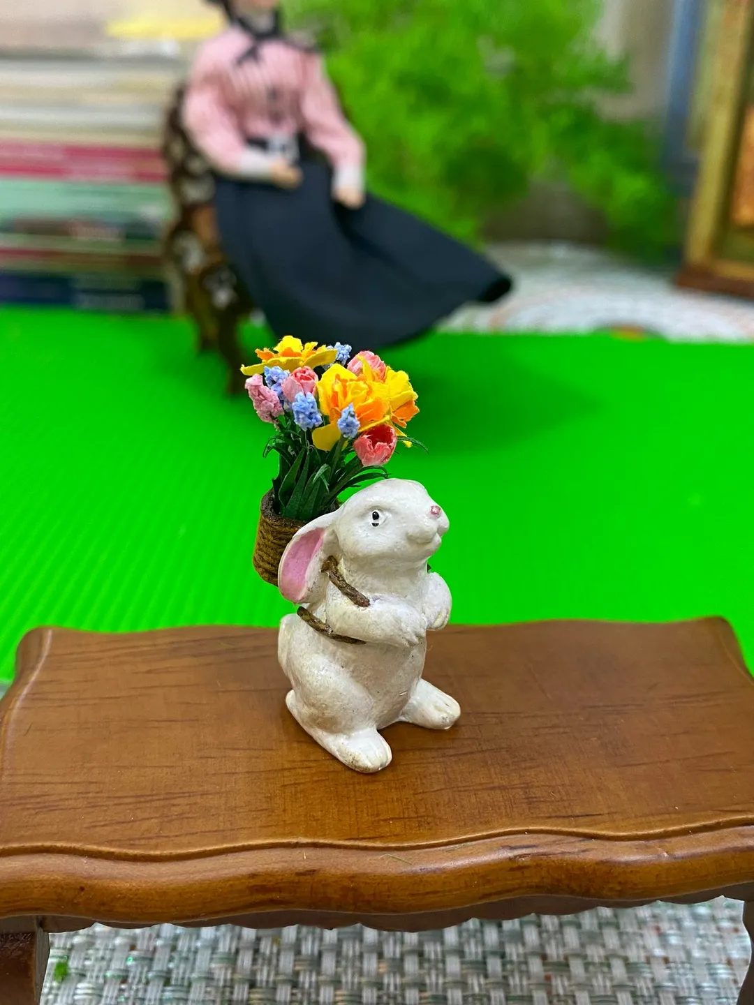 Easter miniature. Bunny with a basket of flowers. 1:12