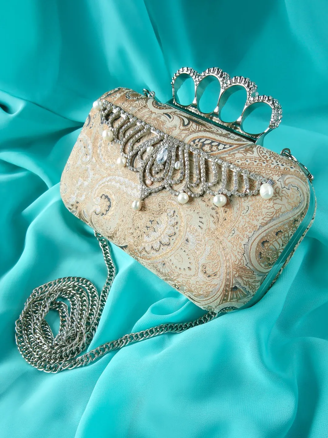 Clutch evening-round from black velvet with stones and brooches.