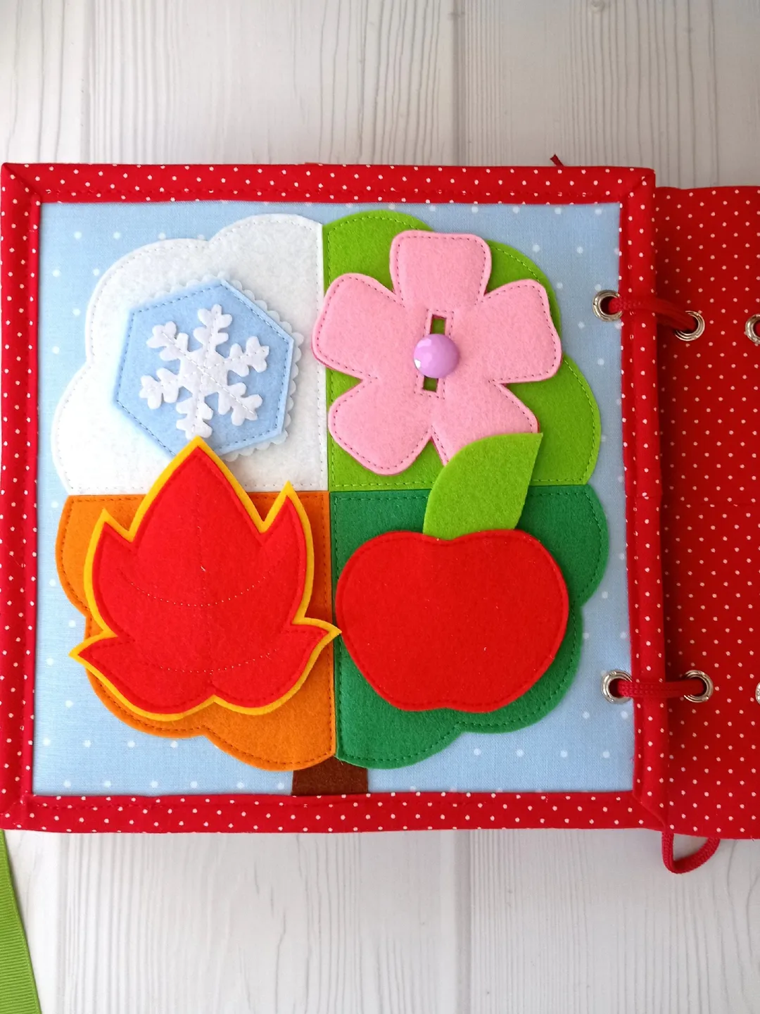 Educational book made of felt and fabric for babies.