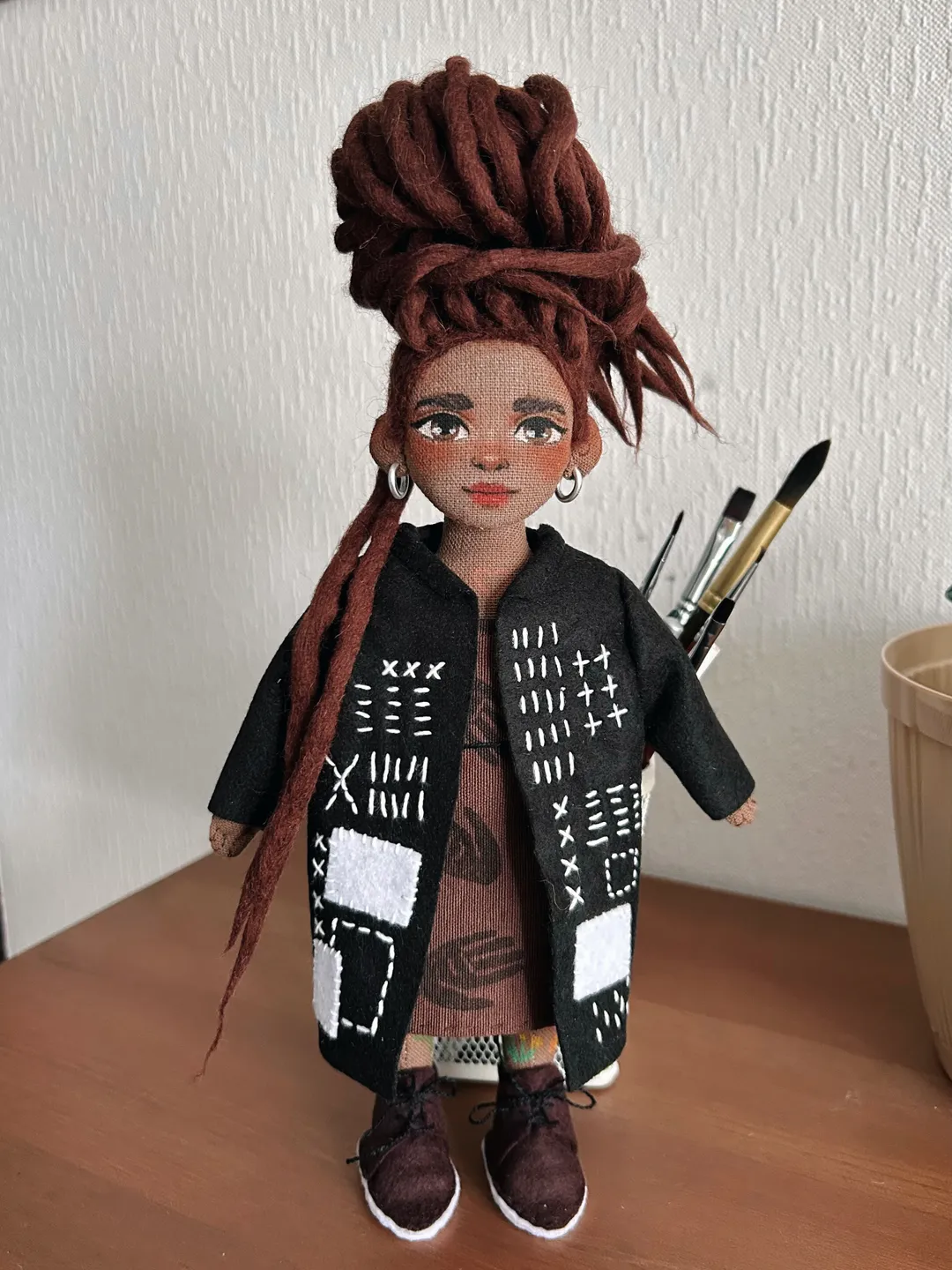 Textile doll lady with brown dreadlocks