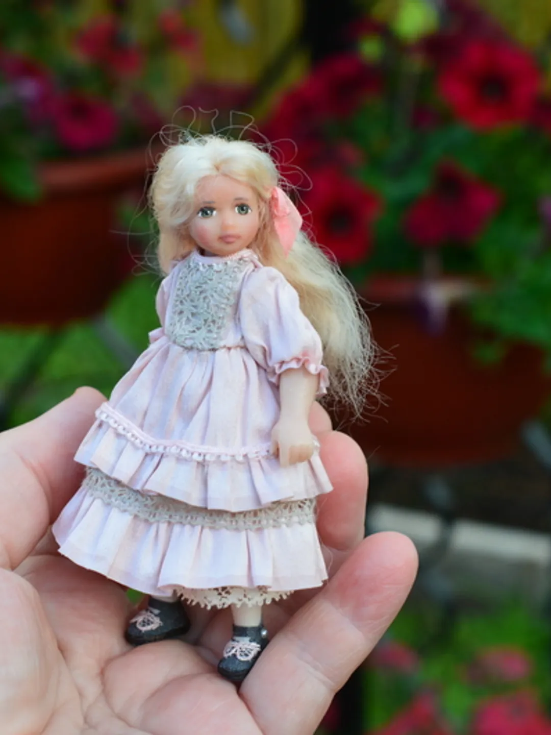 Miniature doll child in 12th scales