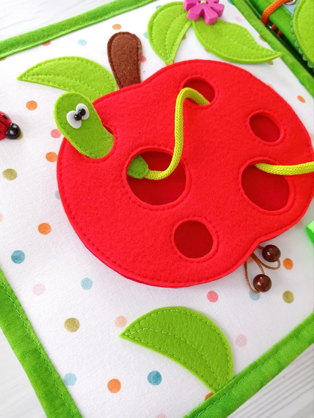 Educational book made of felt and fabric for babies.